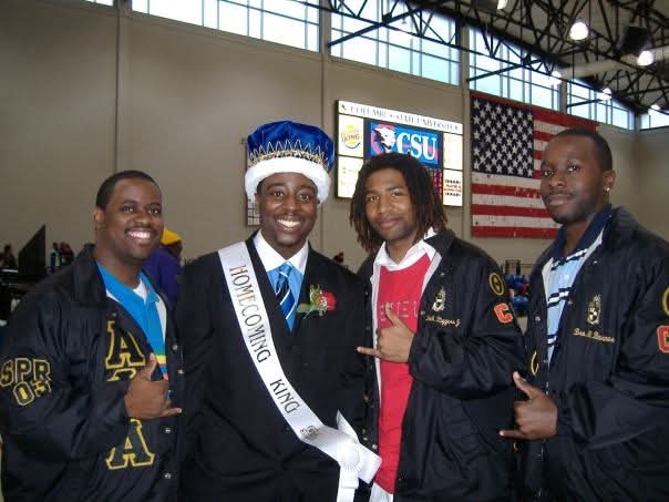 Moore after being crowned homecoming king, with his Alpha Phi Alpha ...
